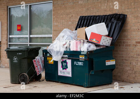 overfilled rubbish or trash bin Stock Photo - Alamy