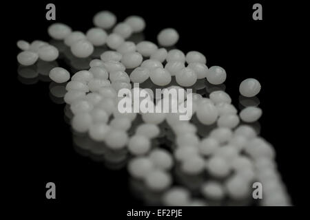 Grains or granules of polymorphic plastic. Unusual types of plastic ...
