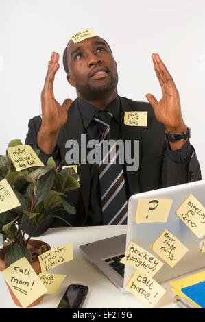 Office desk covered by post it papers with different notes Stock Photo ...