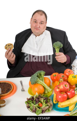 Overweight man making food choices Stock Photo - Alamy