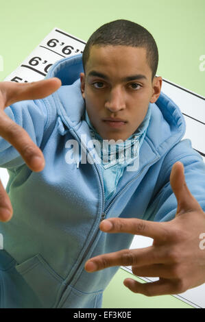 Mug shot of a man rapping Stock Photo - Alamy