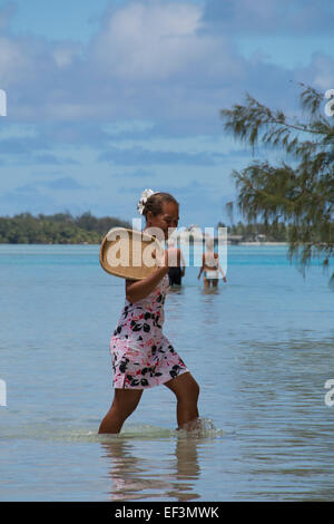 French Polynesia, Bora Bora island, waitress in the wooden design decor ...