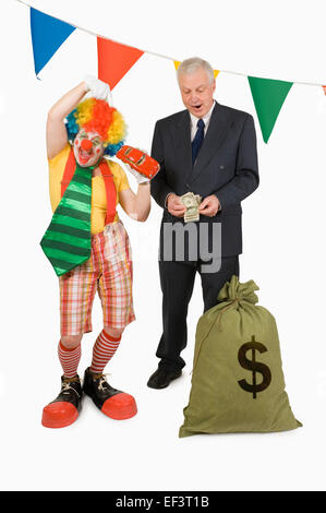 Canada flag and two dollar Stock Photo - Alamy