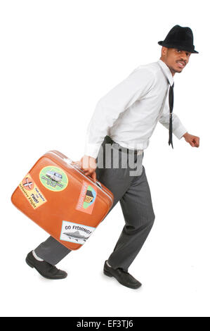 Man running with suitcase in his hand Stock Photo: 78146497 - Alamy