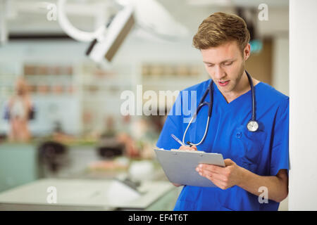 Medical Student Writing Notes in Lecture Hall Stock Photo - Alamy