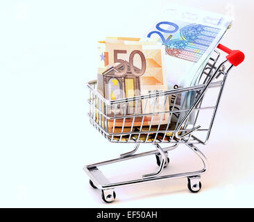 Supermarket Cart Full of Euro banknotes on a pink background with Copy ...