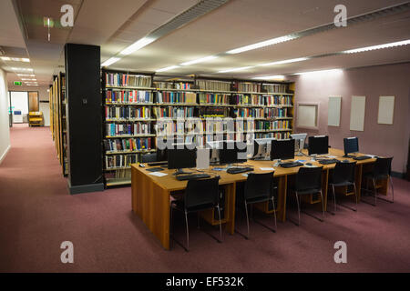 Computer desks in the library Stock Photo - Alamy
