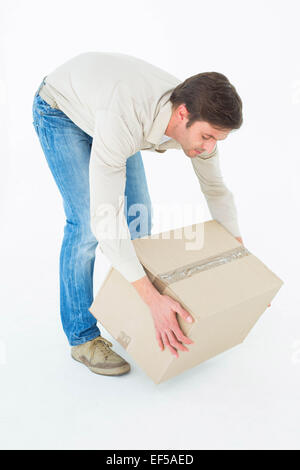 Man picking up cardboard box Stock Photo: 29092895 - Alamy
