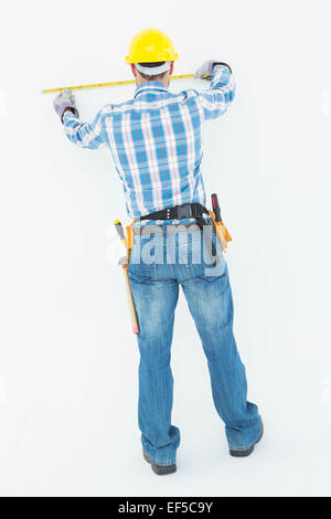 rear view of man hand using smart phone on office desk Stock Photo - Alamy