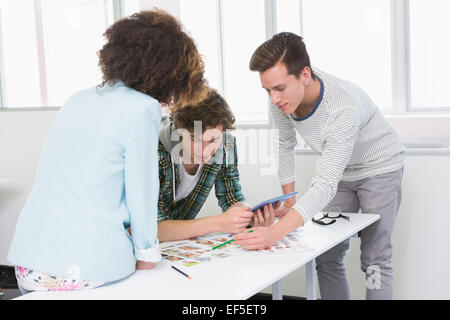 Students working with tablet pc and photos Stock Photo - Alamy