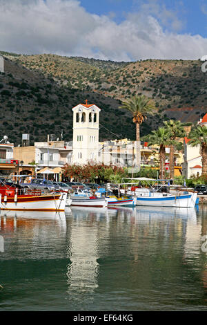 Elounda church and clock tower in Crete, Greece Stock Photo - Alamy