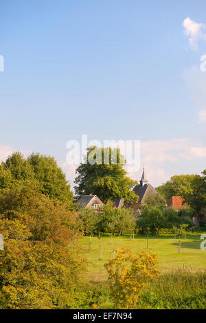 Small Dutch village in landscape Stock Photo - Alamy
