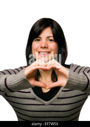 Girl doing hands heart Stock Photo - Alamy