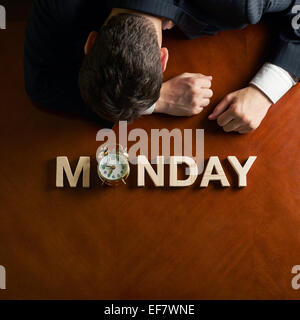 Word Monday and devastated man composition Stock Photo - Alamy