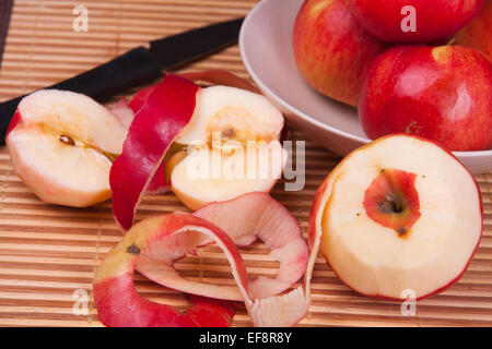 Juicy, ripe, peeled, red apples on a table Stock Photo - Alamy