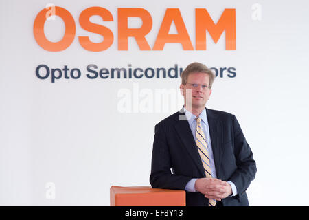 The CEO of semiconductor manufacturer Osram Opto, Aldo Kamper, stand ...