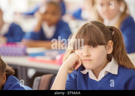 Elementary school children bored in classroom Stock Photo - Alamy