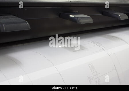 A CAD plotter printing a drawing shot from the right Stock Photo - Alamy