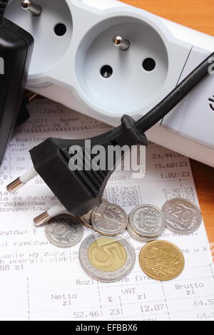 A power cord cable is disconnected from a group of white European ...