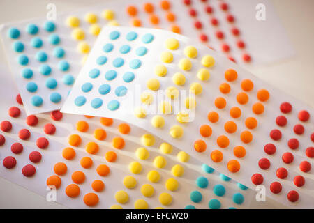 dot candies on strip of paper Stock Photo - Alamy