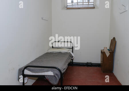Bed in a small jail cell Stock Photo: 78356847 - Alamy