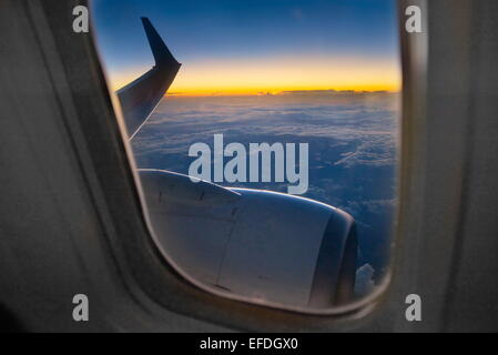 View of clouds from airplane window, clouds in the sky at sunset Stock ...