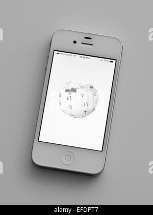 A view of the logo and homescreen of the Wikipedia mobile app on an ...