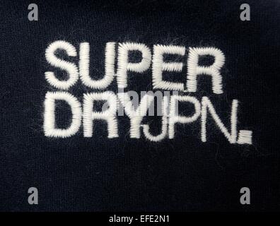 Superdry clothing label logos Stock Photo - Alamy