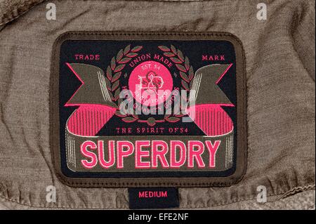 Superdry clothing label logos Stock Photo - Alamy