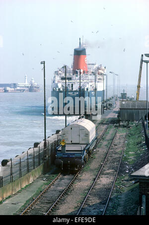 A rail wagon transporting an NTL nuclear fuel flask (concealed beneath ...