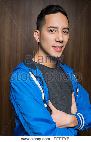 Casual Man with Arms Crossed wearing leather jacket isolated on white ...