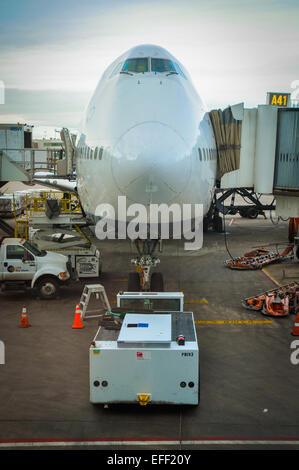 Loading aircraft before take off Stock Photo - Alamy