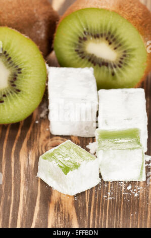 Lukum (Turkish Delight) with kiwi fruit, closeup shot, local focus ...