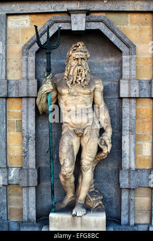Ancient statue and historical buildings of Antwerp, Belgium Stock Photo ...