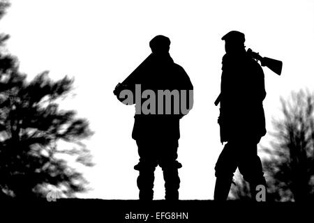Man with shotgun over his shoulder Stock Photo: 17484532 - Alamy