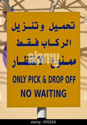 Warning sign in Arabic and English text Dubai United Arab Emirates ...