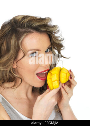 Young Woman Eating Mango Model Released Stock Photo - Alamy