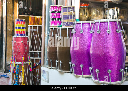 Various colorful musical instruments drums in asia street market near ...