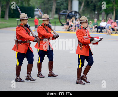 Mounties marching in the Sunset Retreat Ceremony at the Royal Canadian ...