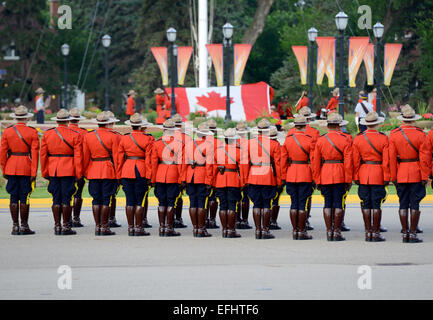 Mounties marching in the Sunset Retreat Ceremony at the Royal Canadian ...