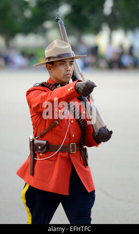 Mounties marching in the Sunset Retreat Ceremony at the Royal Canadian ...