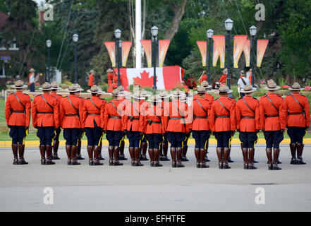 Mounties marching in the Sunset Retreat Ceremony at the Royal Canadian ...