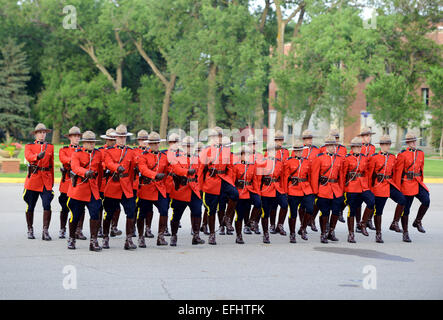 Mounties marching in the Sunset Retreat Ceremony at the Royal Canadian ...
