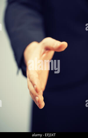 Open hand shake, studio and business man with welcome, deal or ...