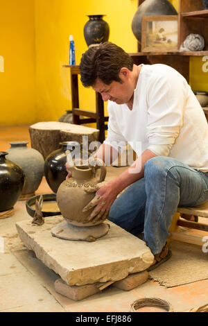 San Bartolo Coyotepec, Mexico - Javier Nieto Castillo demonstrates the ...