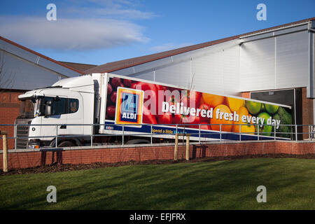 Aldi supermarket food delivery lorry and Krone trailer with colourful ...