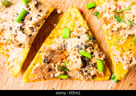 Tapas. Chips, tacos with meat paste, herbs and spices Stock Photo - Alamy