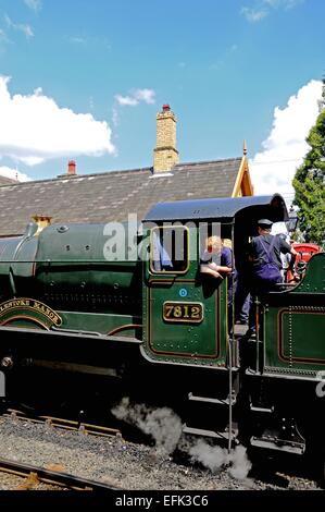 Footplate and cabin of a steam locomotive engine, showing dials, levers ...