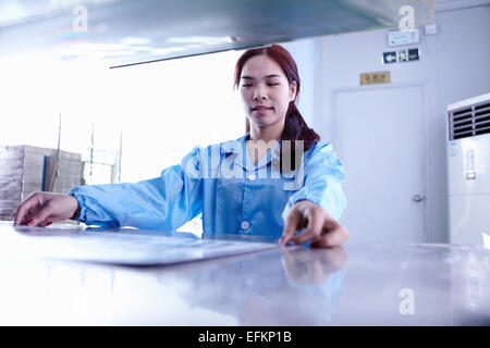 Technician working in LED factory Stock Photo - Alamy