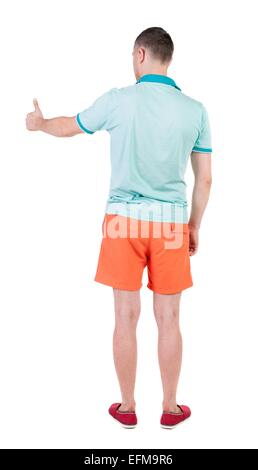 Back view of man shows thumbs up Stock Photo - Alamy
